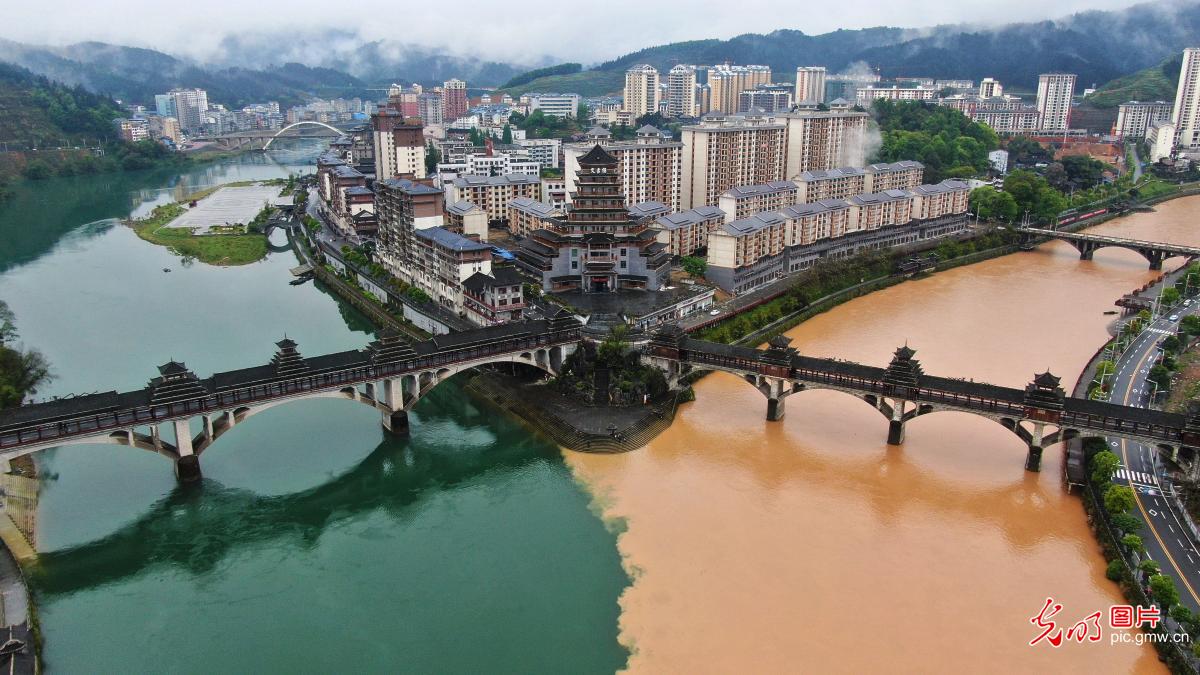Divided water color at the confluence of rivers in SW China's Guizhou(1)